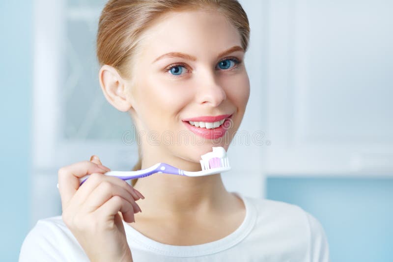 Happy Girl with Toothbrush stock photo. Image of paste - 82117686