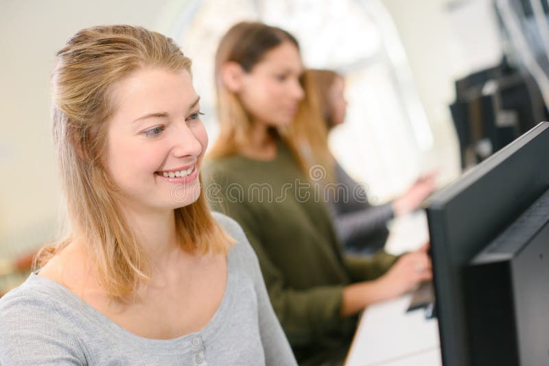 Happy girl using laptop stock image. Image of beauty - 264391783