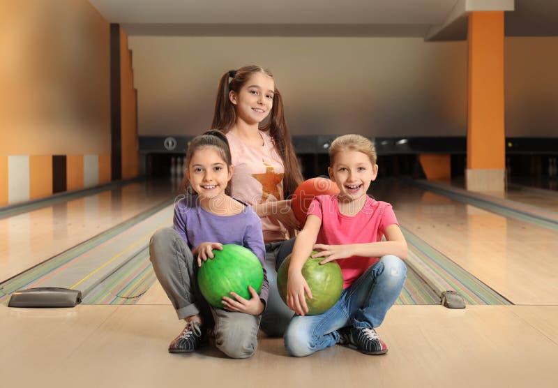 Happy Girls with Balls in Bowling Stock Image - Image of birthday ...