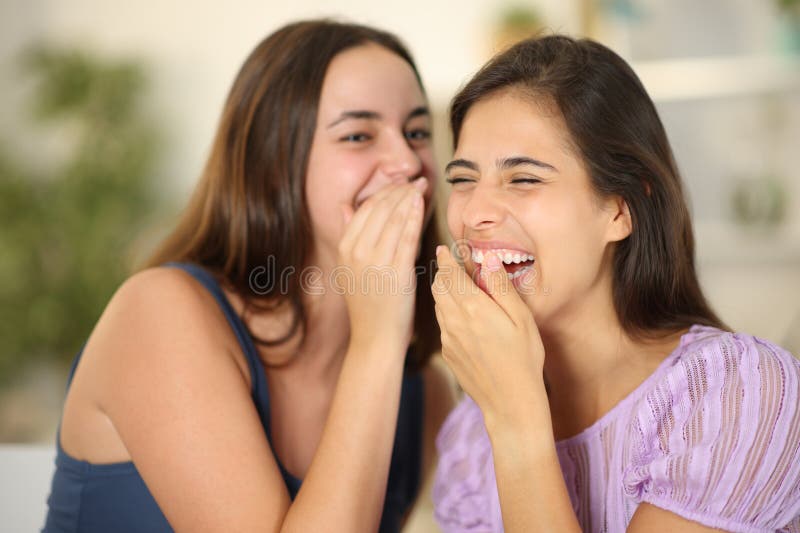 Happy Girls Telling Secrets and Laughing Stock Photo - Image of gossip ...