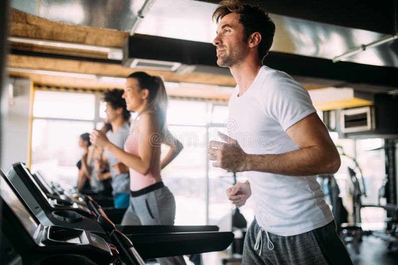 Happy Gorup of Healthy People Training in Gym Stock Image - Image of ...