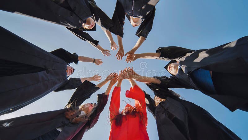 The Happy Graduates Join Hands and Disperse. Stock Image - Image of ...