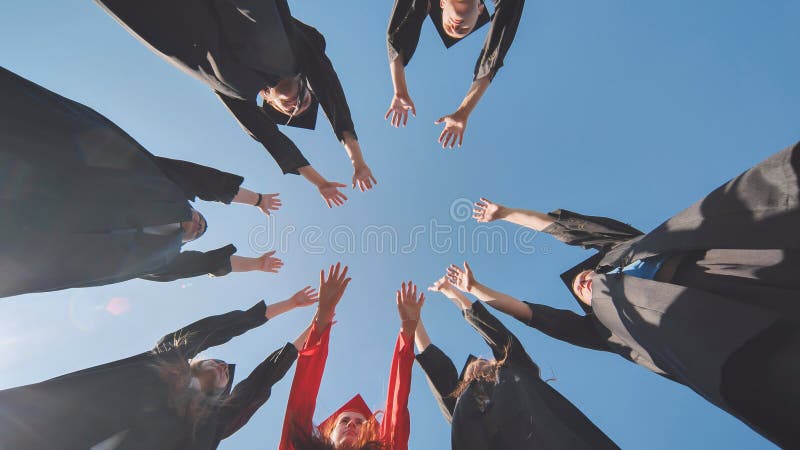 The Happy Graduates Join Hands and Disperse. Stock Photo - Image of ...