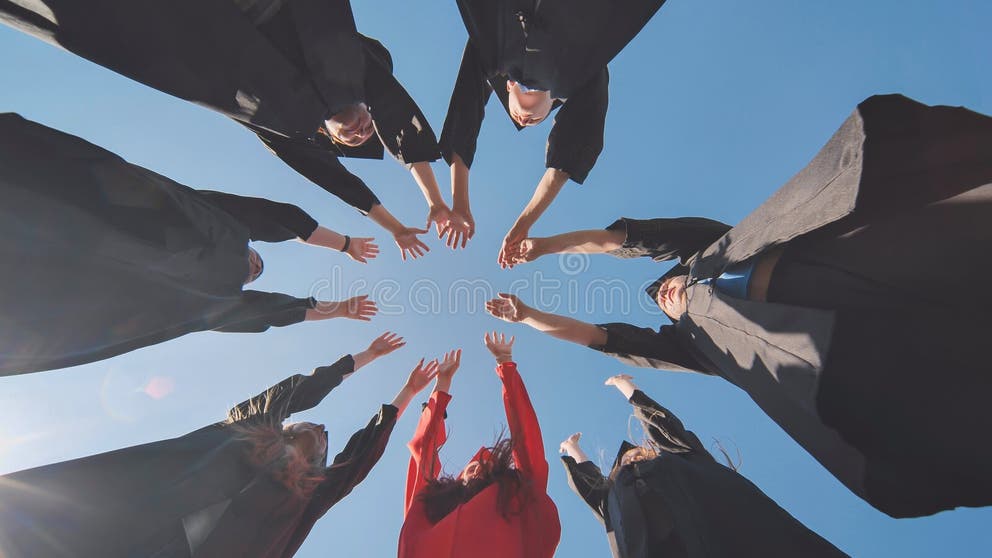 The Happy Graduates Join Hands and Disperse. Stock Image - Image of ...