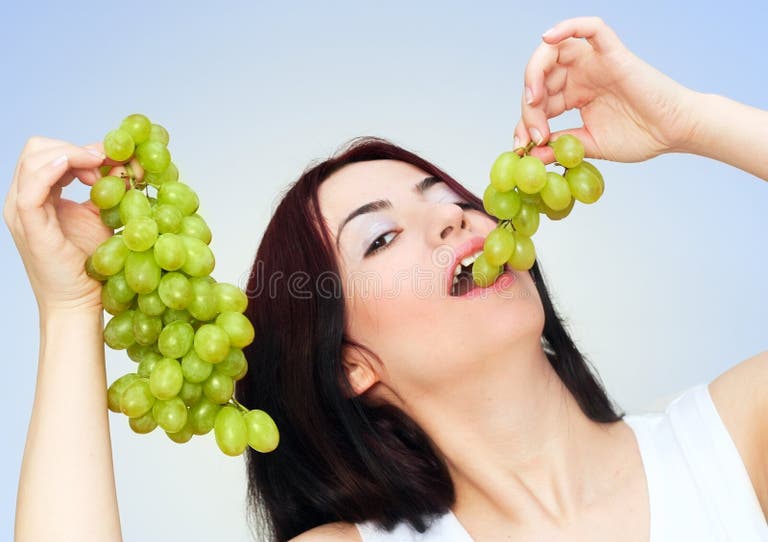 Happy grapes eating stock image. Image of hair, eating - 2061437