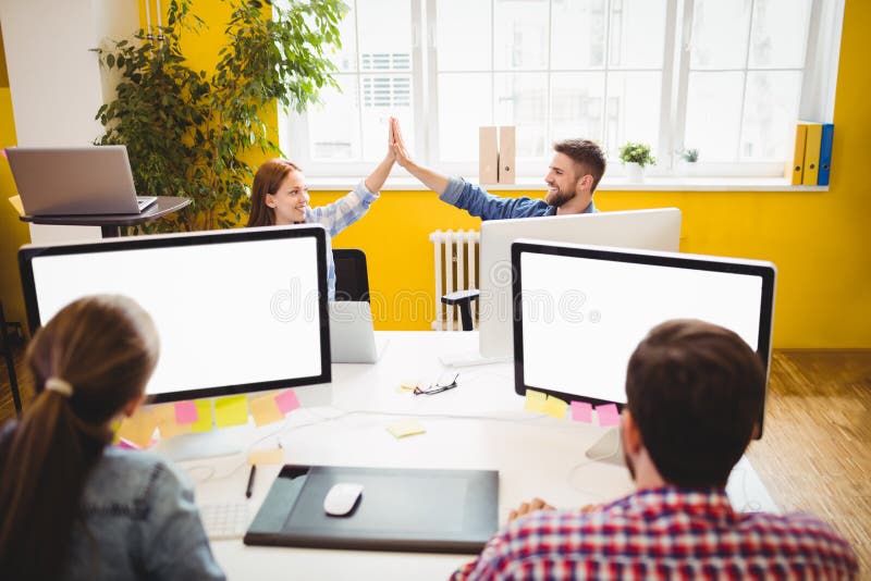 Happy Graphic Designers Giving High-five Stock Image - Image of adult ...