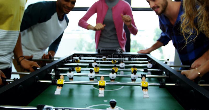 Happy Graphic Designers Playing Table Football Stock Video - Video of ...