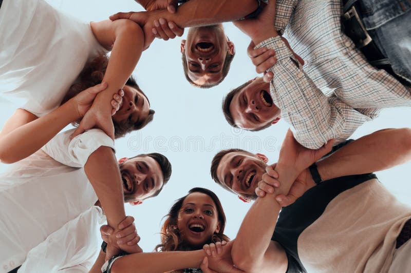 Happy Group of Businesspeople Stacking Their Hands in Cooperatio Stock ...