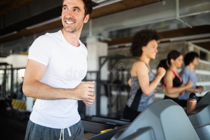 Happy Gorup of Healthy People Training in Gym Stock Image - Image of ...