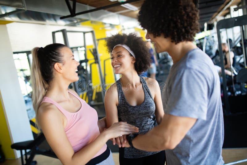 Happy Gorup of Healthy People Training in Gym Stock Photo - Image of ...