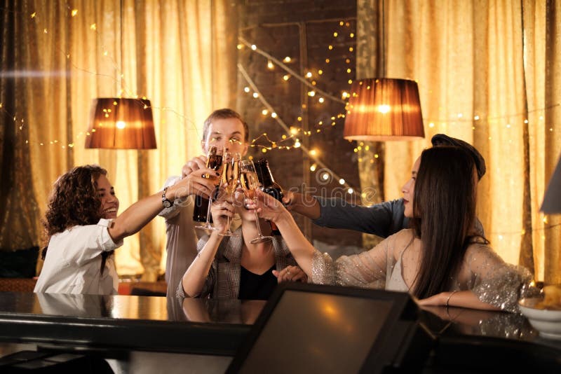 Happy Group of Friends at the Bar Having Drinks. Stock Image - Image of ...