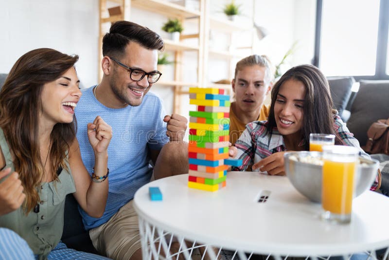 Happy Group of Friends Have Fun and Playing Board Game Together Stock ...