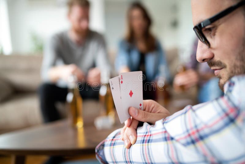 Group of Happy Friends Playing Cards and Drinking Stock Image - Image ...