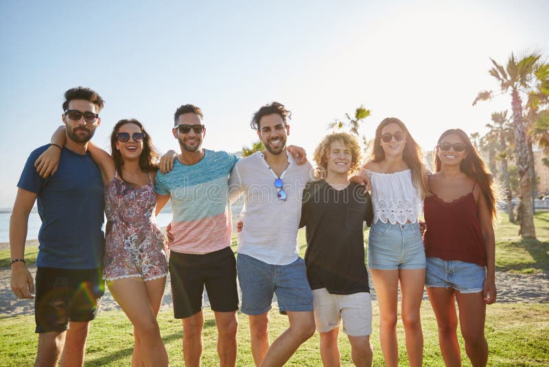 Happy Group of Friends Standing Together in Row Outside Stock Image ...