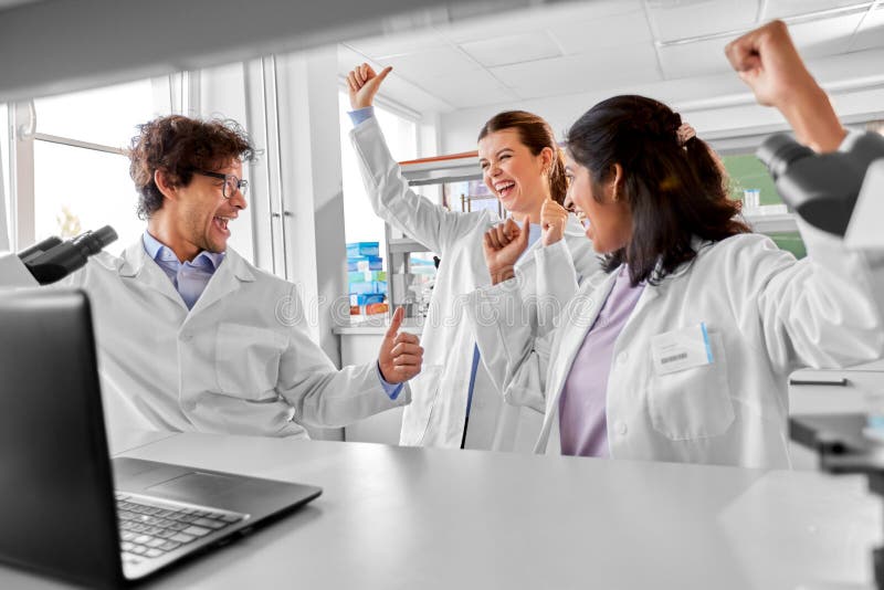 Happy Group of Scientists Working in Laboratory Stock Image - Image of ... Happy Group of Scientists Working in Laboratory Stock Image - Image of ...