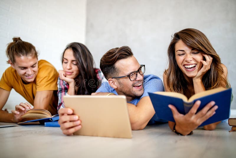 Happy Group of Students Studying and Working Together in a College ...