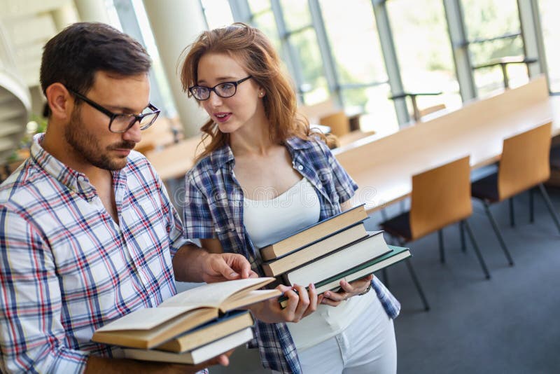 Happy Group of Students Studying and Working Together in a College ...
