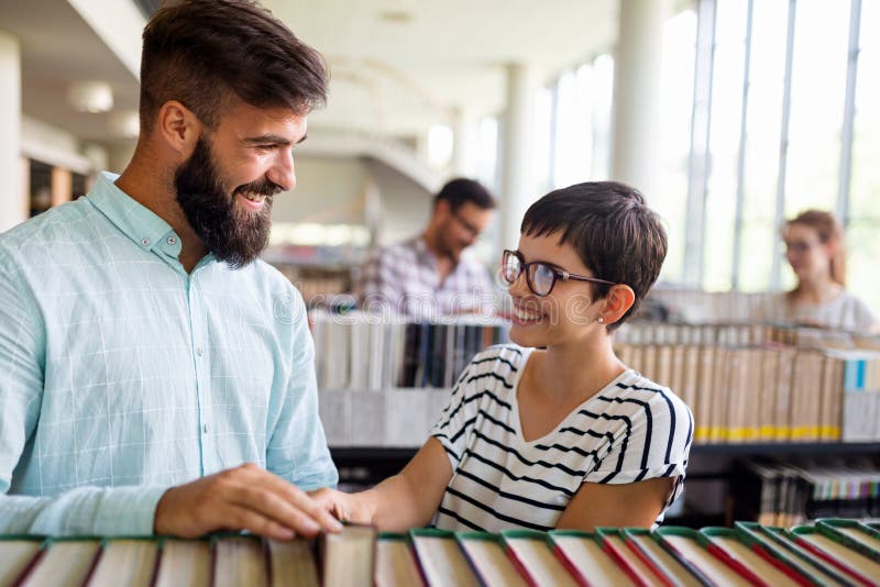 Happy Group of Students Studying and Working Together in a College ...