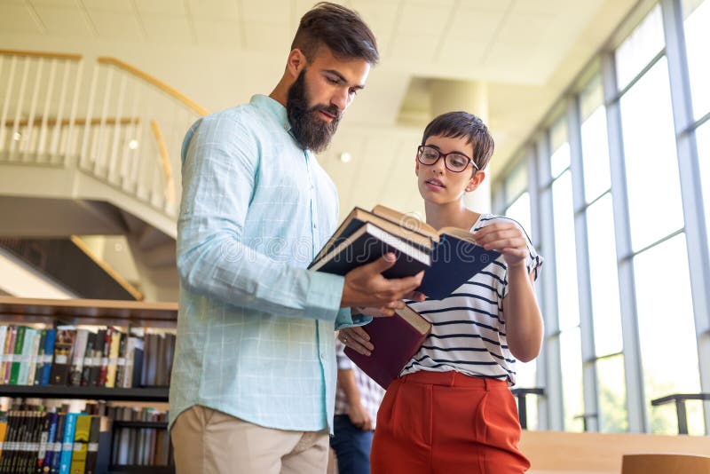 Happy Group of Students Studying and Working Together in a College ...