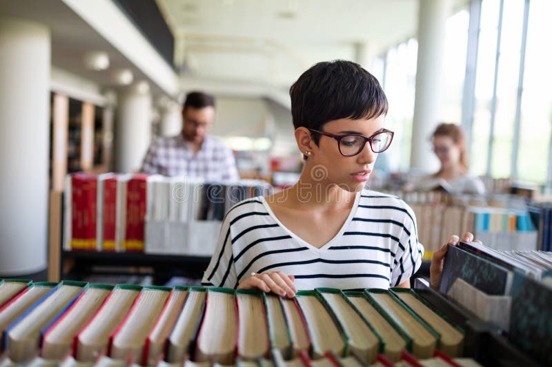 Happy Group of Students Studying and Working Together in a College ...