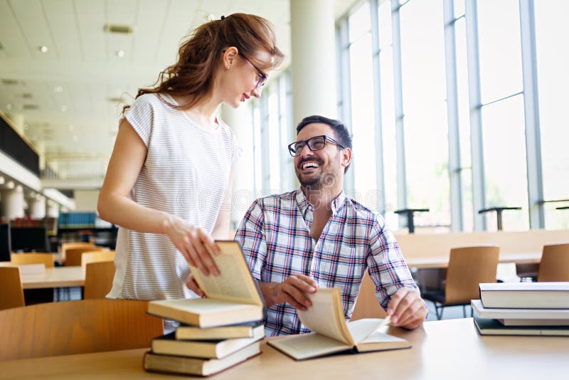 Happy Group of Success Students Studying and Working Together in a ...