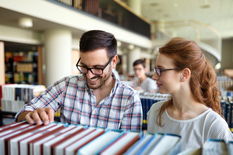 Happy Group of Students Studying and Working Together in a College ...