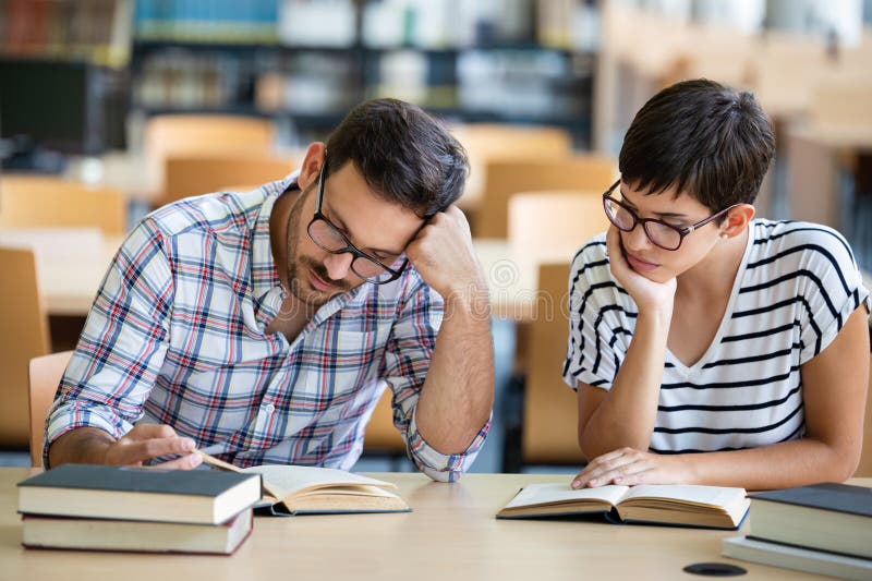 Happy Group of Students Studying and Working Together in a College ...