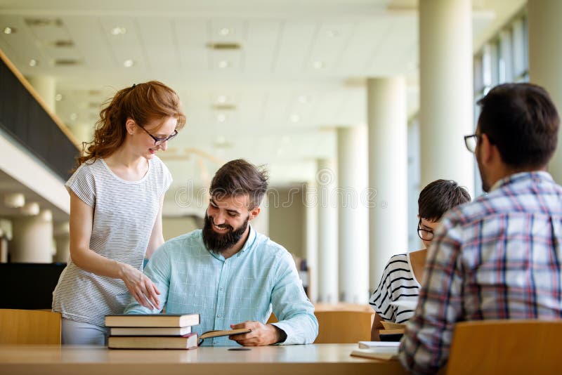 Happy Group of Success Students Studying and Working Together in a ...