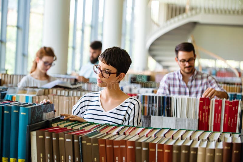 Happy Group of Success Students Studying and Working Together in a ...