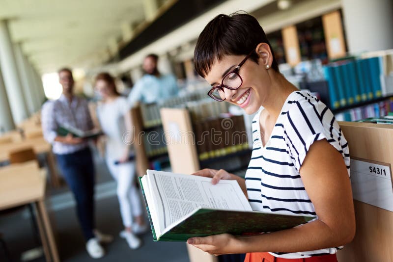 Happy Group of Success Students Studying and Working Together in a ...