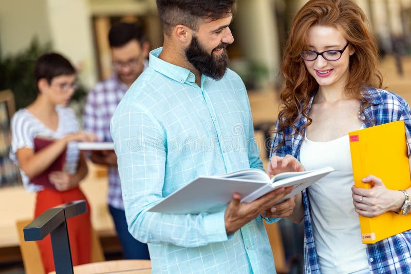 Happy Group of Success Students Studying and Working Together in a ...