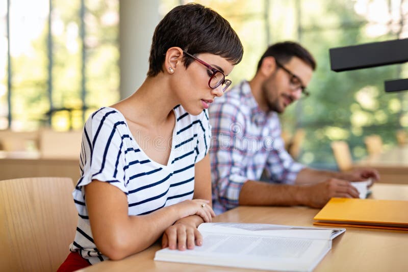 Happy Group of Success Students Studying and Working Together in a ...