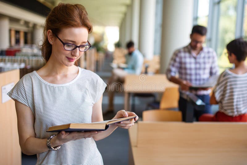 Happy Group of Success Students Studying and Working Together in a ...