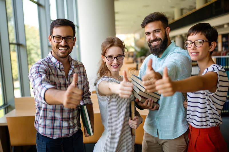 Happy Group of Students Studying and Working Together in a College ...