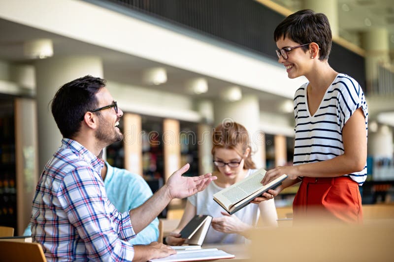 Happy Group of Success Students Studying and Working Together in a ...