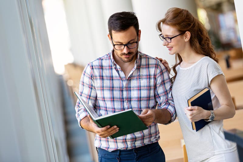 Happy Group of Success Students Studying and Working Together in a ...