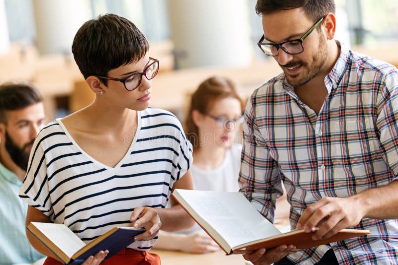 Happy Group of Success Students Studying and Working Together in a ...