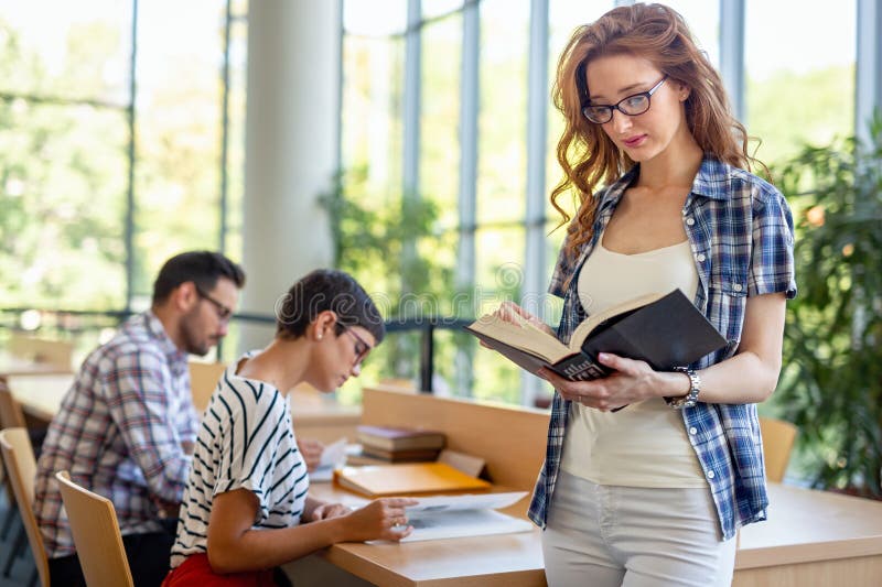 Happy Group of Success Students Studying and Working Together in a ...