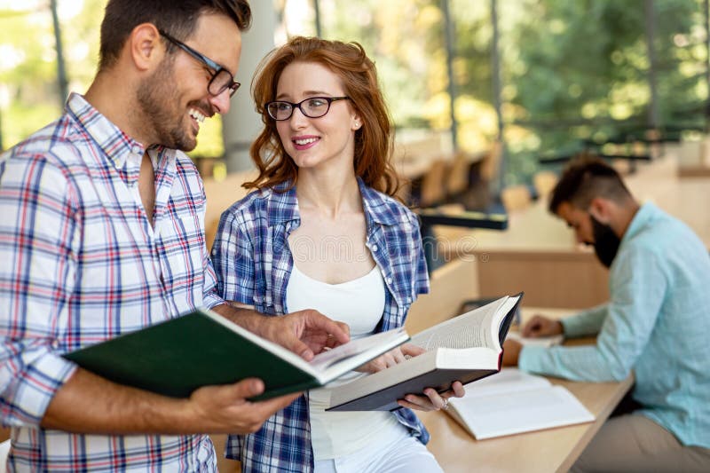 Happy Group of Success Students Studying and Working Together in a ...