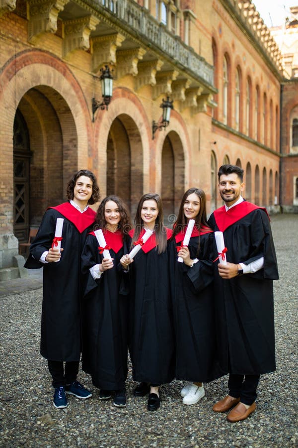Young Happy Group of University Graduates at Graduation Ceremony Stock ...