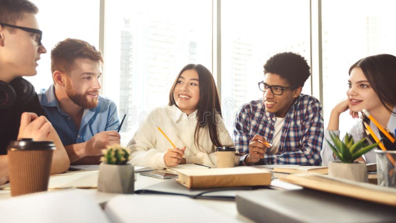 Happy Groupmates Preparing for Final Exams in Library Together Stock ...