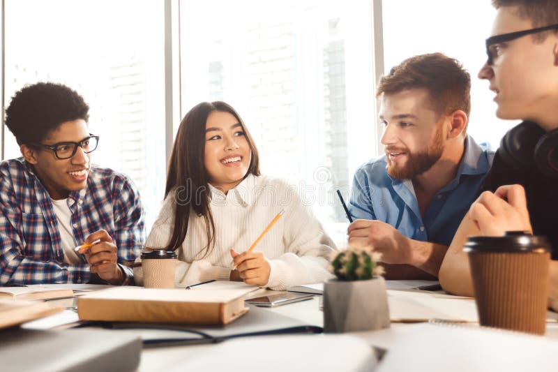 Happy Groupmates Preparing for Final Exams in Library Together Stock ...
