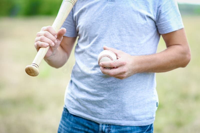 A Happy Guy with Baseball Bat on Nature Concept in Park Stock Photo ...