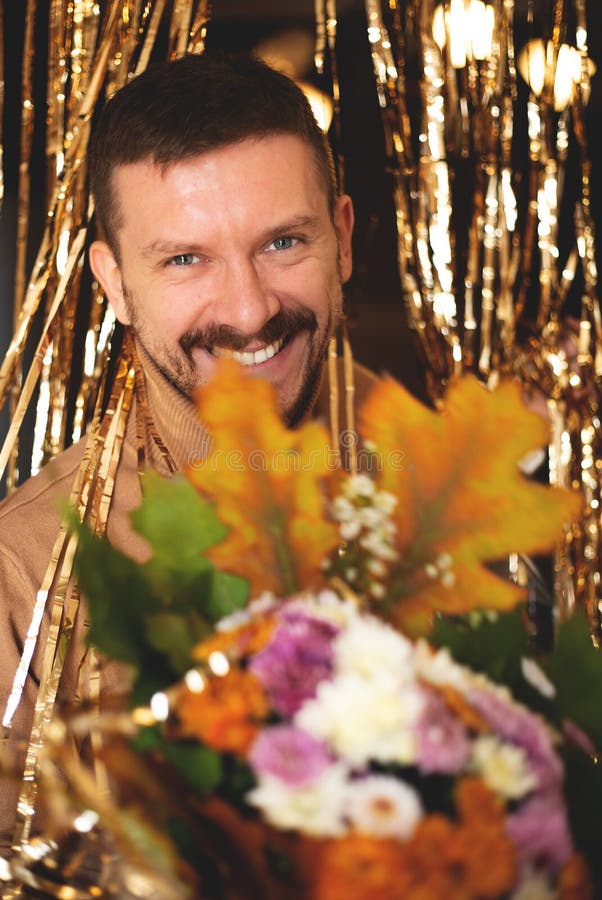 Guy with a Bouquet of Flowers Stock Photo - Image of suit, portrait ...