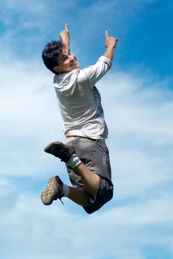 Happy guy jumping stock photo. Image of celebrate, lucky - 12331370