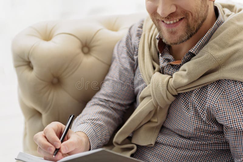 Happy Guy Making Notes in Writing-pad Stock Image - Image of confident ...