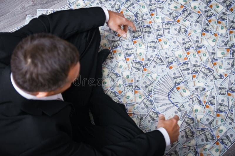 A Happy Guy with Money in His Hands for the Development of Shopping ...