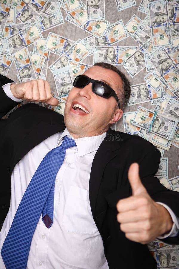 A Happy Guy with Money in His Hands for the Development of Shopping ...