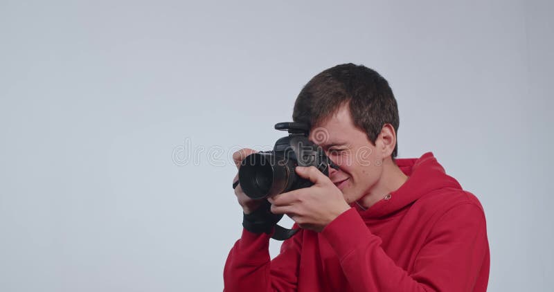 Happy Guy Photographer Professional Shoots Model in Studio, Behind the ...