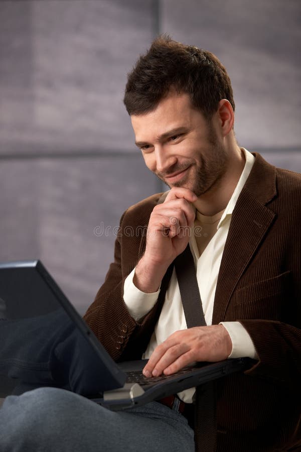 Happy Guy Smiling with Laptop Stock Image - Image of browsing, happy ...